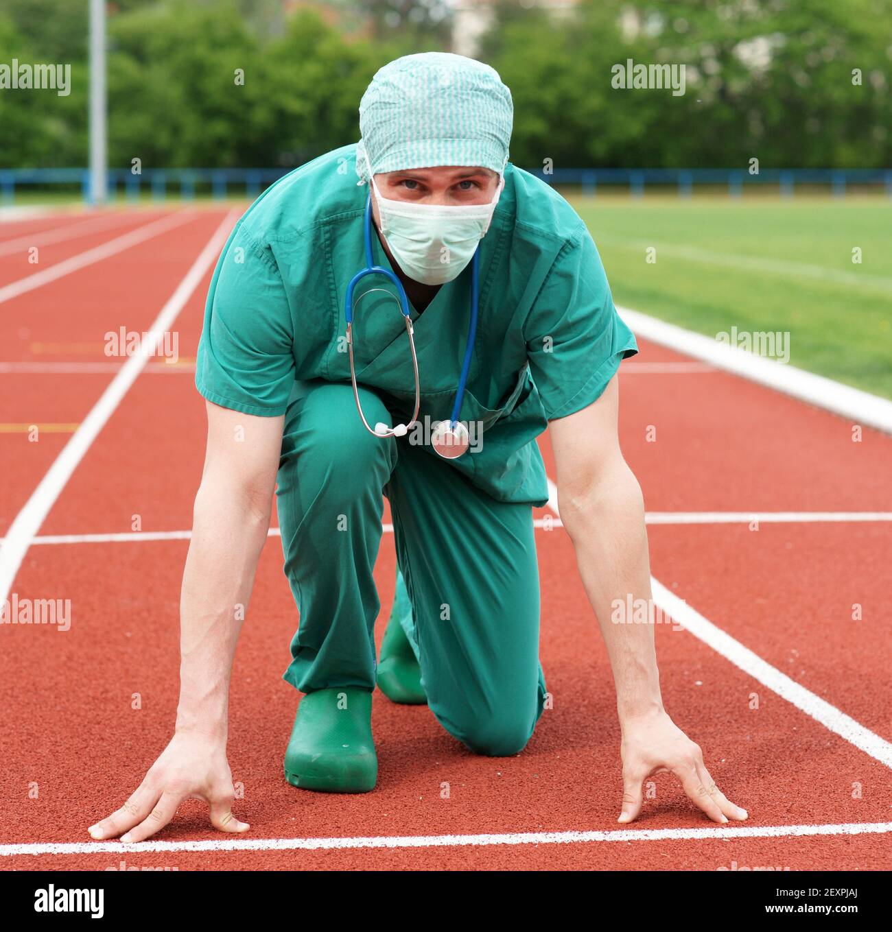 Doctor Surgical Clothing On Starting Position In Stadium Competition