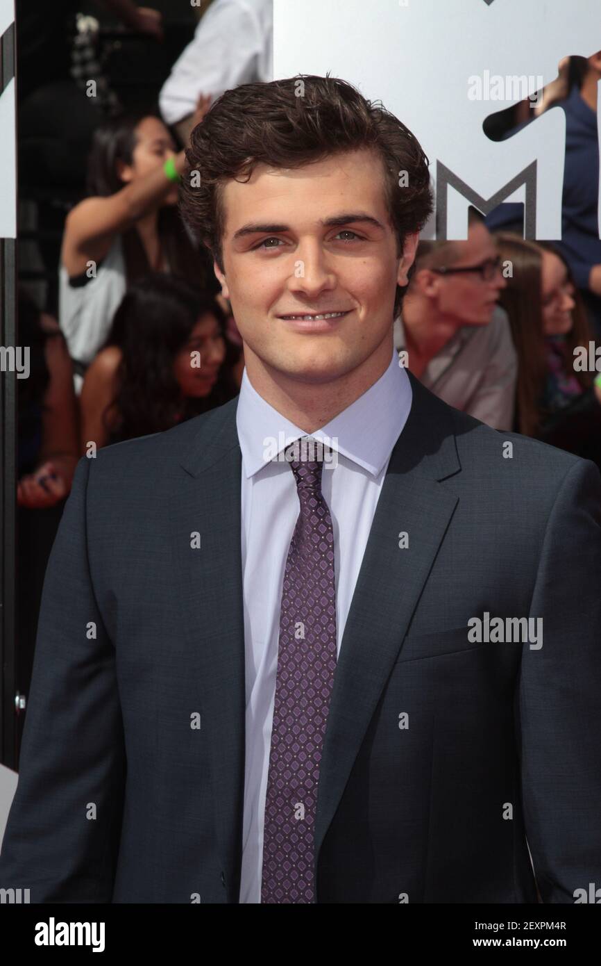 Actor Beau Mirchoff arrives at the 2014 MTV Movie Awards held at the ...