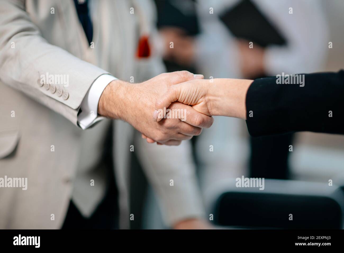 close up. business handshake on an office background Stock Photo - Alamy