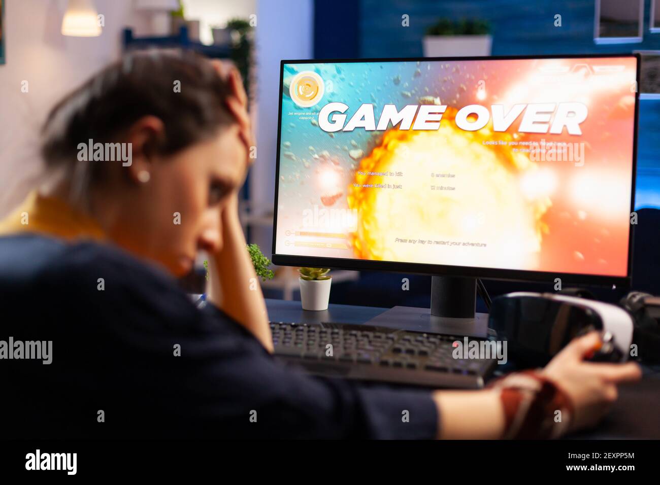 Caucasian gamer losing space shooter videogame competition on ...