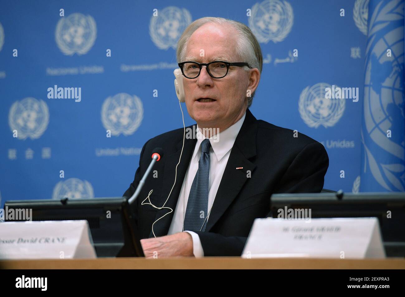 Professor David Crane addresses members of the press before presenting ...