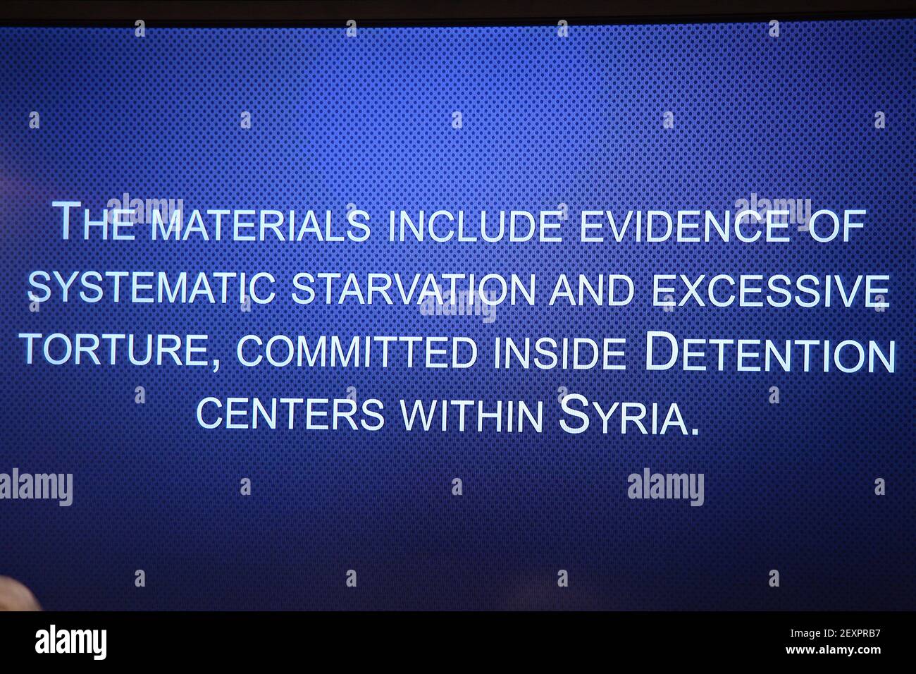 Forensic pathologist Dr. Stuart Hamilton, right, presents one of the ...