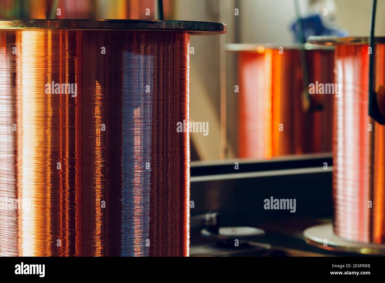 Copper wire reels in cable factory close up Stock Photo - Alamy