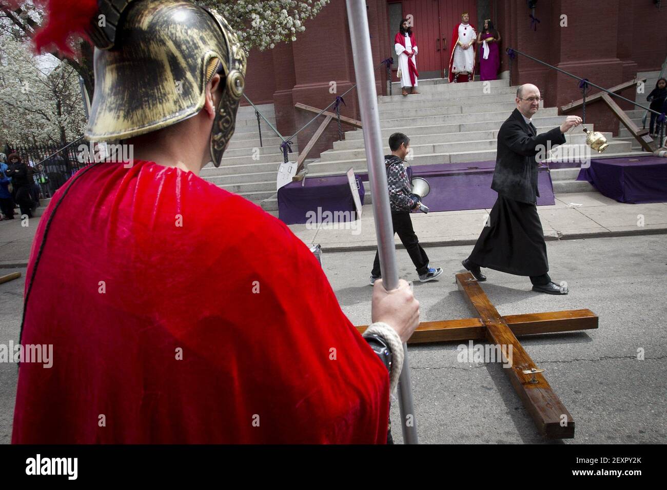Father Bruce Lewandowski, right, blesses the participants in the annual ...