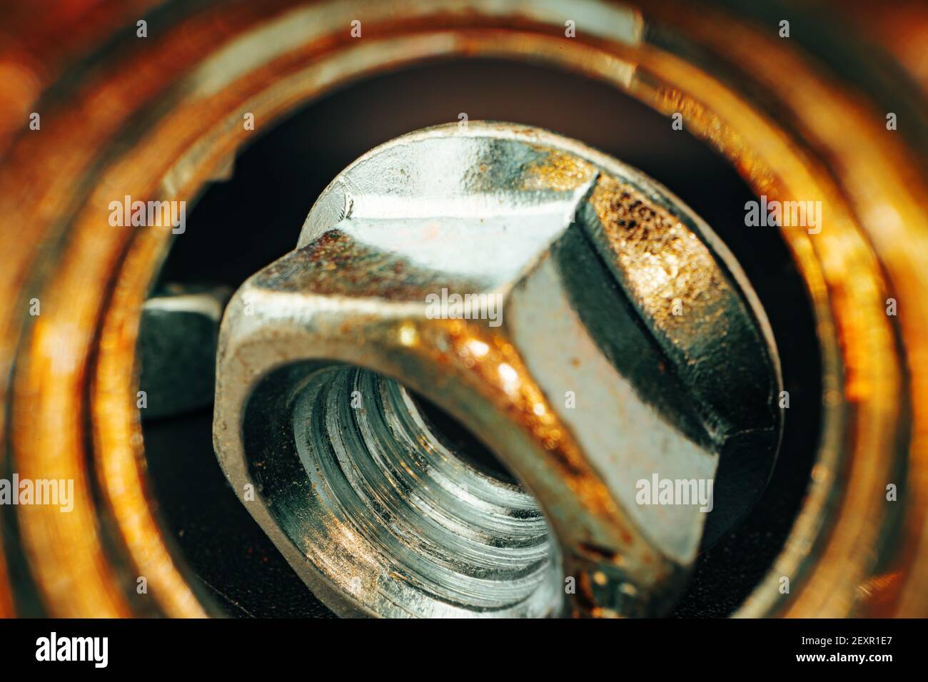 Metal nut on black background close up Stock Photo - Alamy