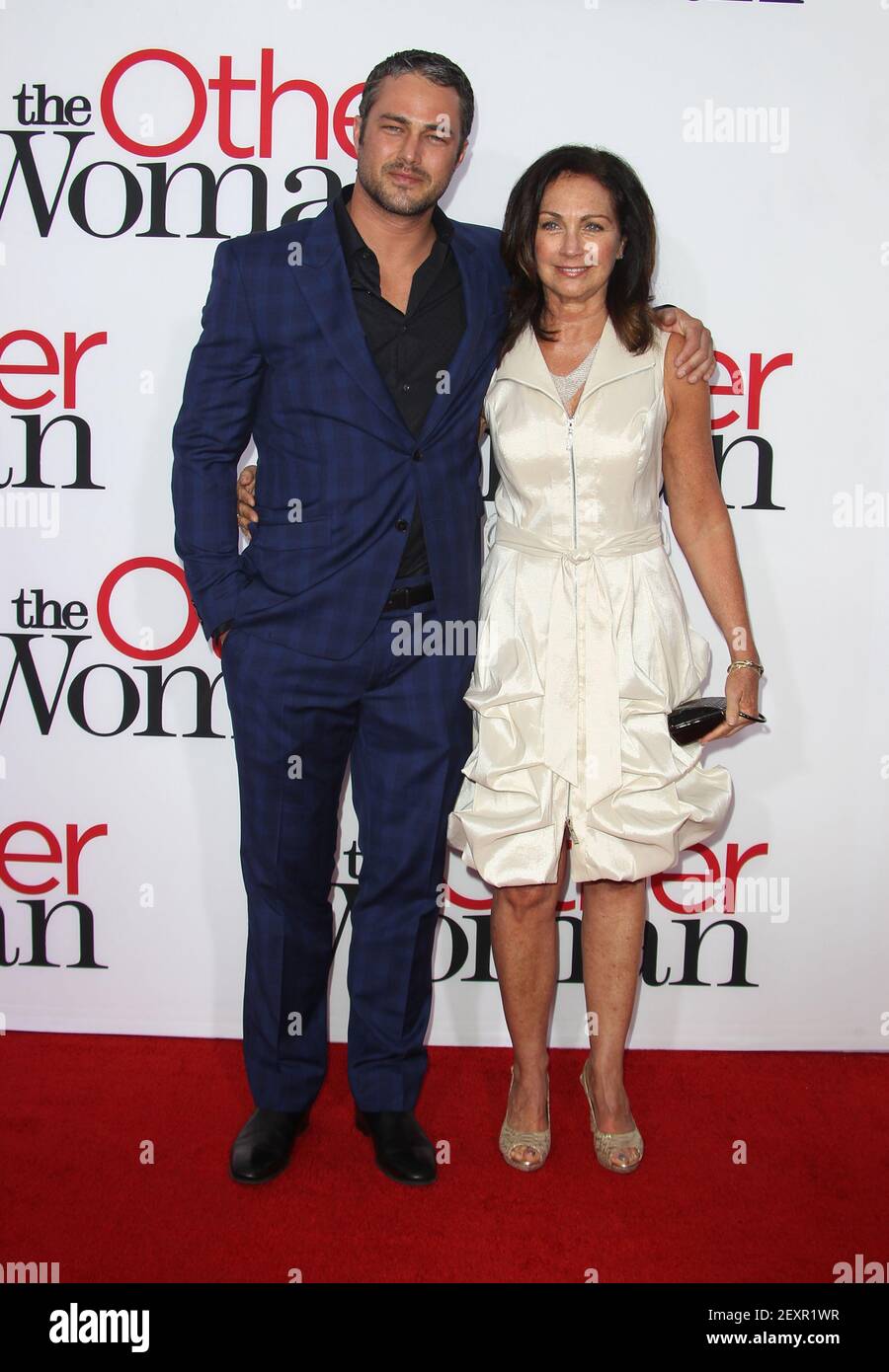 21 April 2014 - Hollywood, California - Taylor Kinney, Pamela Heisler ...