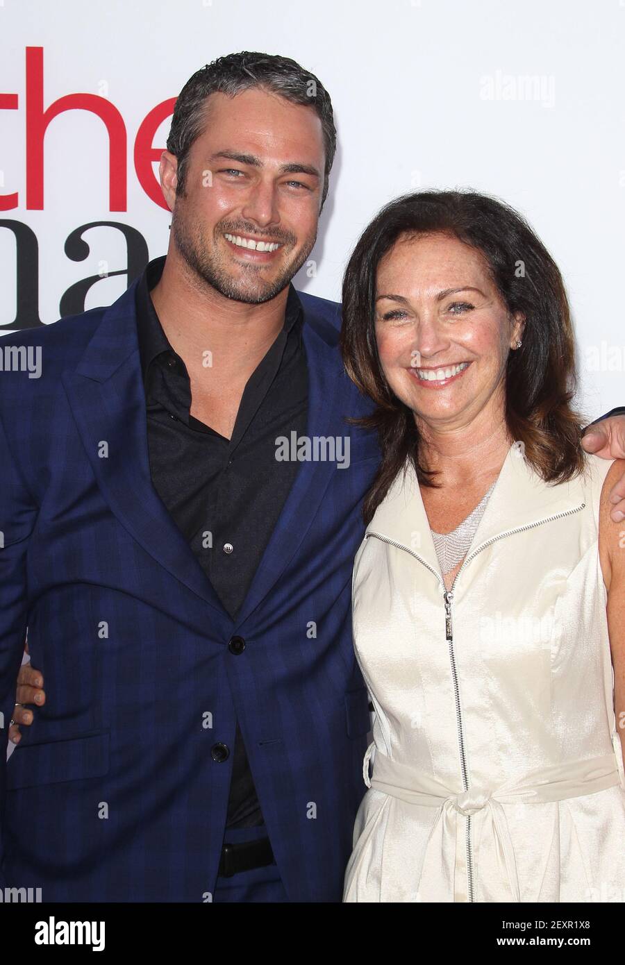 21 April 2014 - Hollywood, California - Taylor Kinney, Pamela Heisler ...