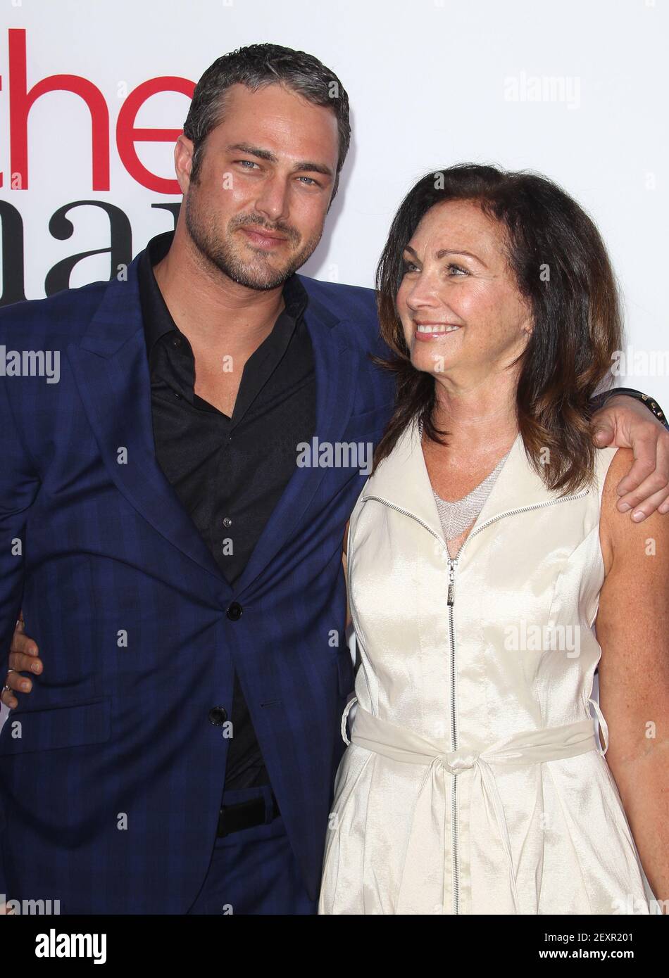 21 April 2014 - Hollywood, California - Taylor Kinney, Pamela Heisler ...