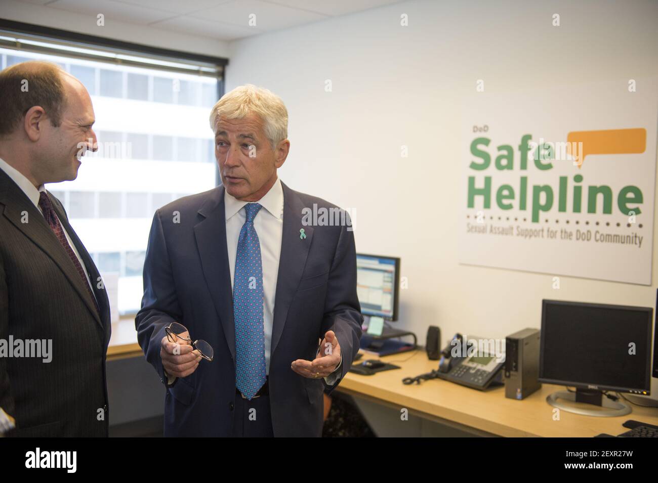 Secretary of Defense Chuck Hagel speaks with Scott Berkowitz, the ...