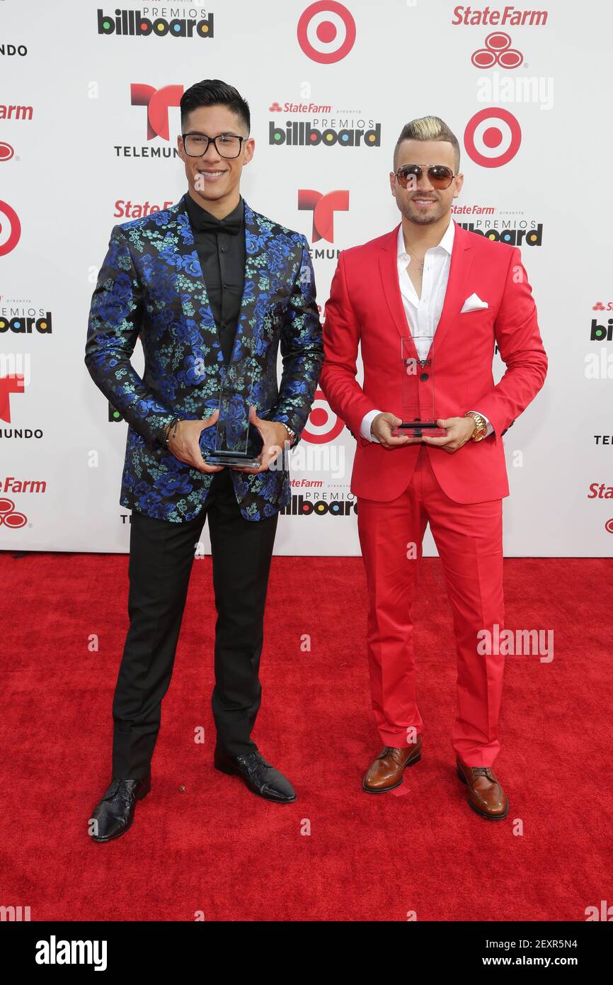 Chino y Nacho are seen at the Red Carpet Arrivals of Billboard Latin ...