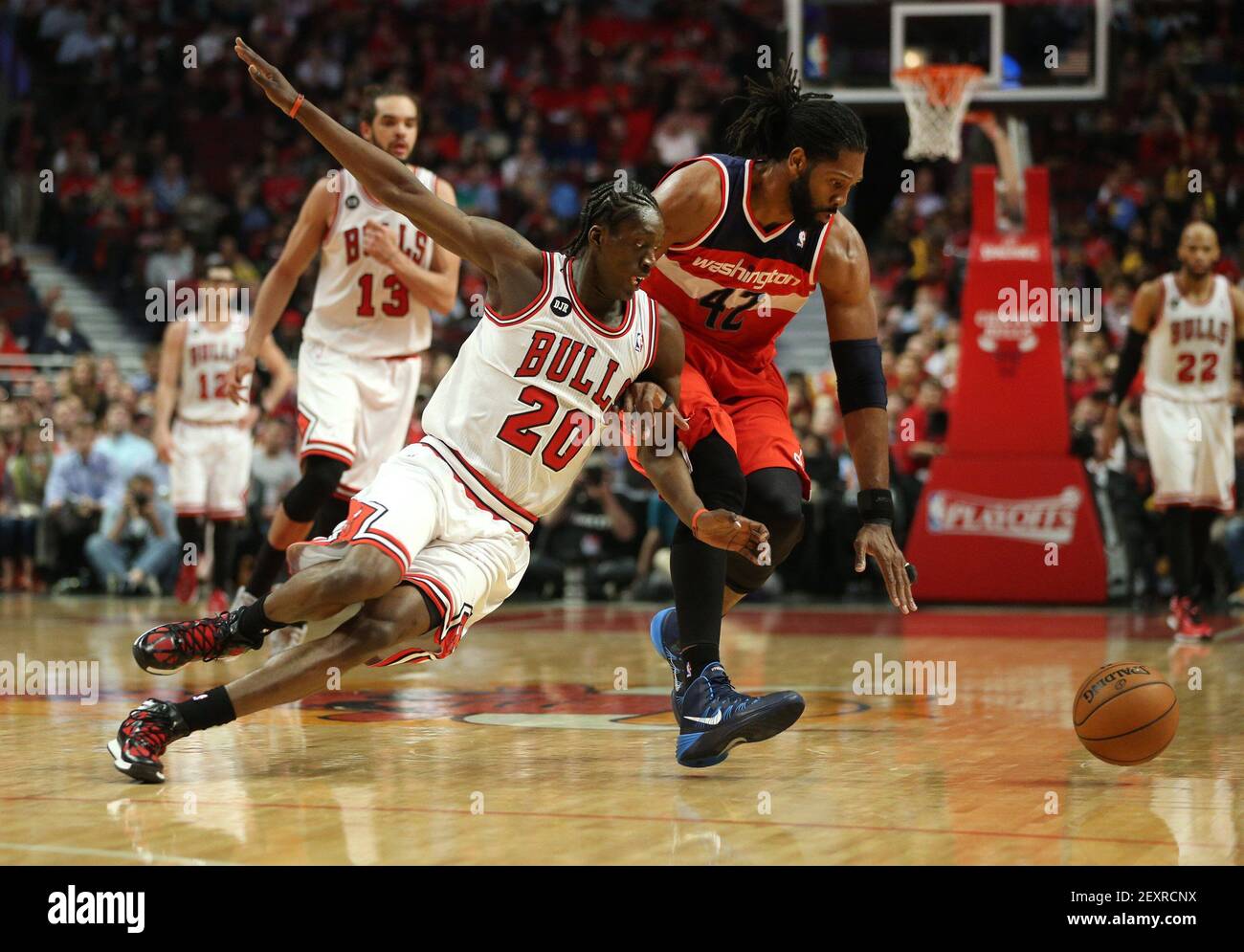 The Chicago Bulls' Tony Snell (20) and the Washington Wizards' Nene ...