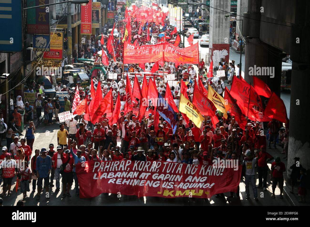 MANILA, PHILIPPINES - MAY 1: Protesters march along Recto Avenue ...