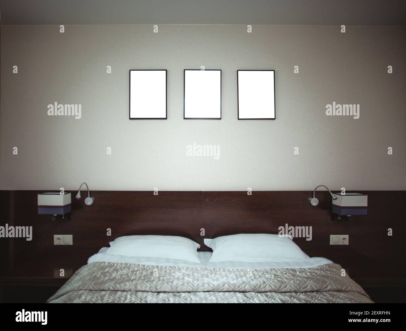 Interior of a comfortable hotel bedroom in the morning in luxury style ...