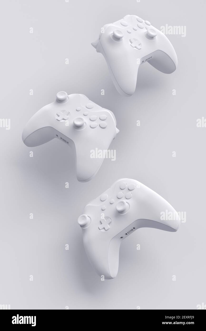 Flying gamer joysticks or gamepads on white background Stock Photo - Alamy