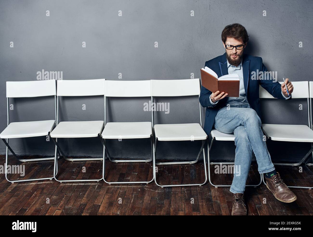 Man sitting on a chair waiting for job interview work lifestyle ...