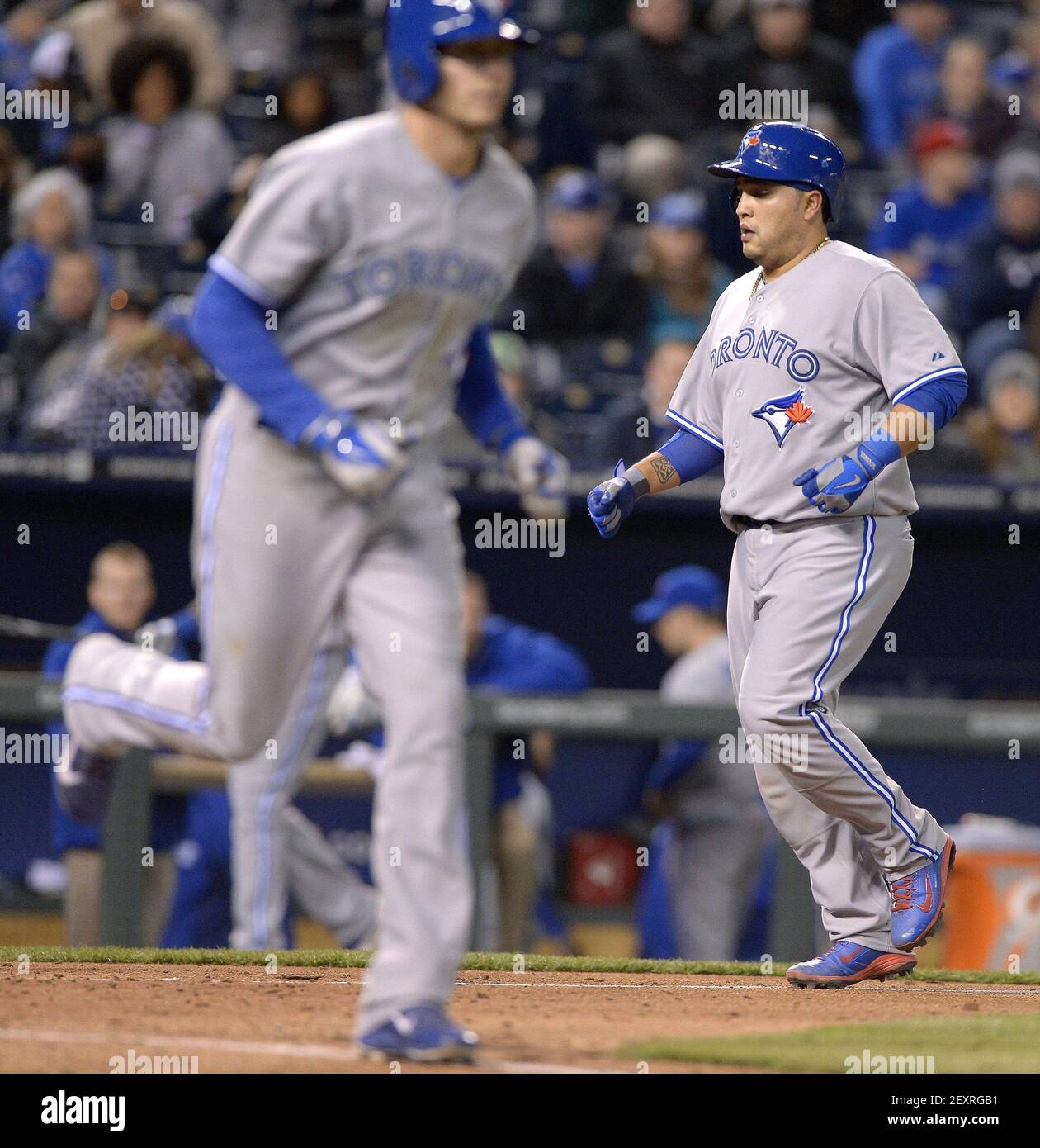 The Toronto Blue Jays' Dioner Navarro (30) walks home after Kansas City ...