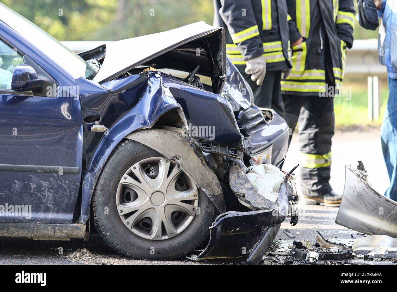 Auto accident. Crashed car in the street. Damaged car after collision ...
