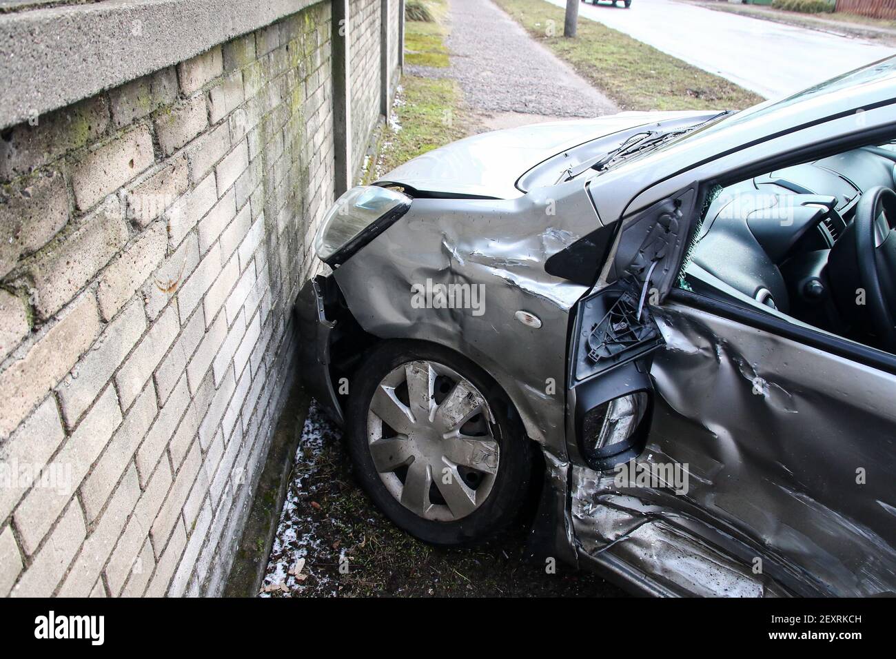 Car accident in the street. Smashed auto after car collision Stock ...