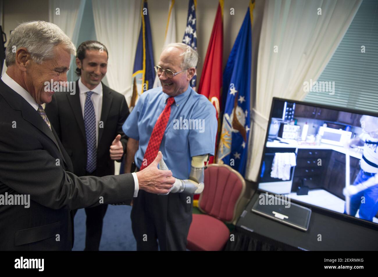 Secretary of Defense Chuck Hagel has a thumb war with Frederick Downs ...