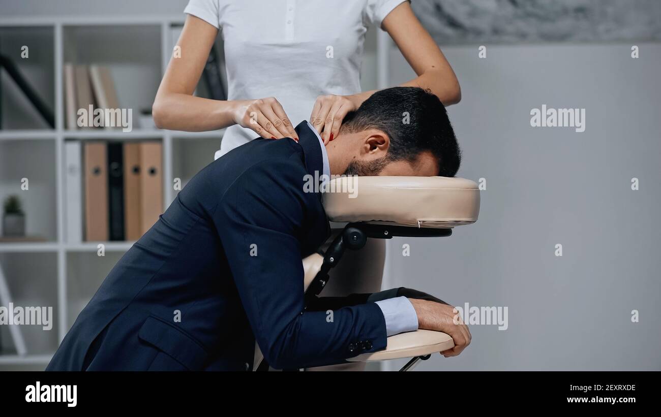 Massage suit hi-res stock photography and images - Alamy