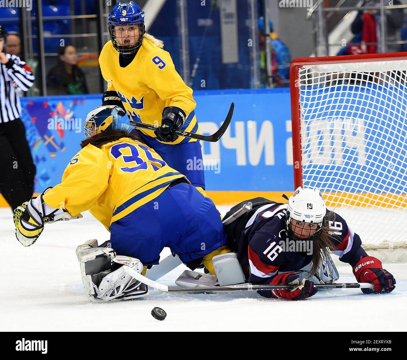 USA forward Kelli Stack (16) watches the puck bounce away after a shot ...