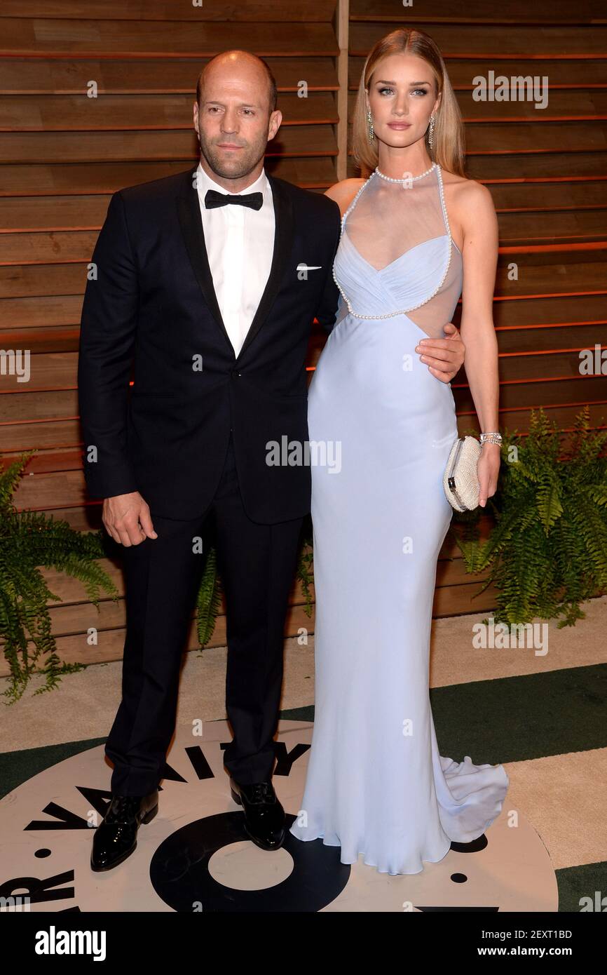 Jason Statham, Rosie Huntington-Whiteley arrives at the 2014 Vanity ...