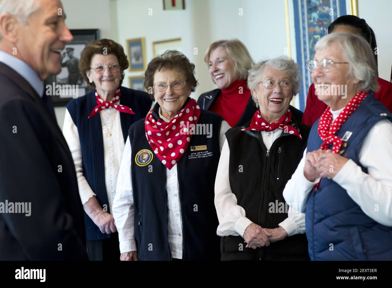 Secretary of Defense Chuck Hagel laughs with (left to right front row ...