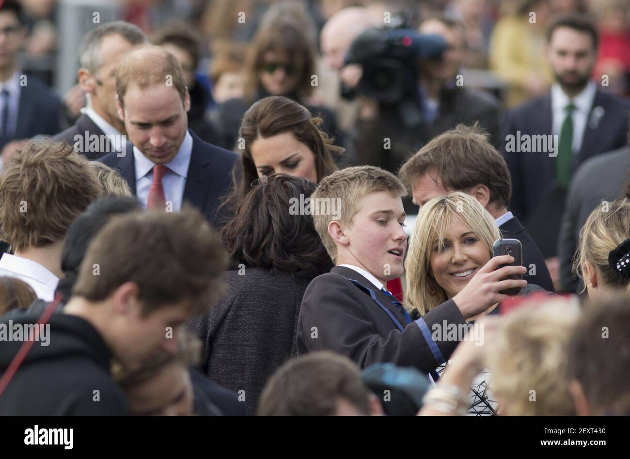 Liana Bush and her son Curtis Loose (centre), 16, take a quick selfie ...