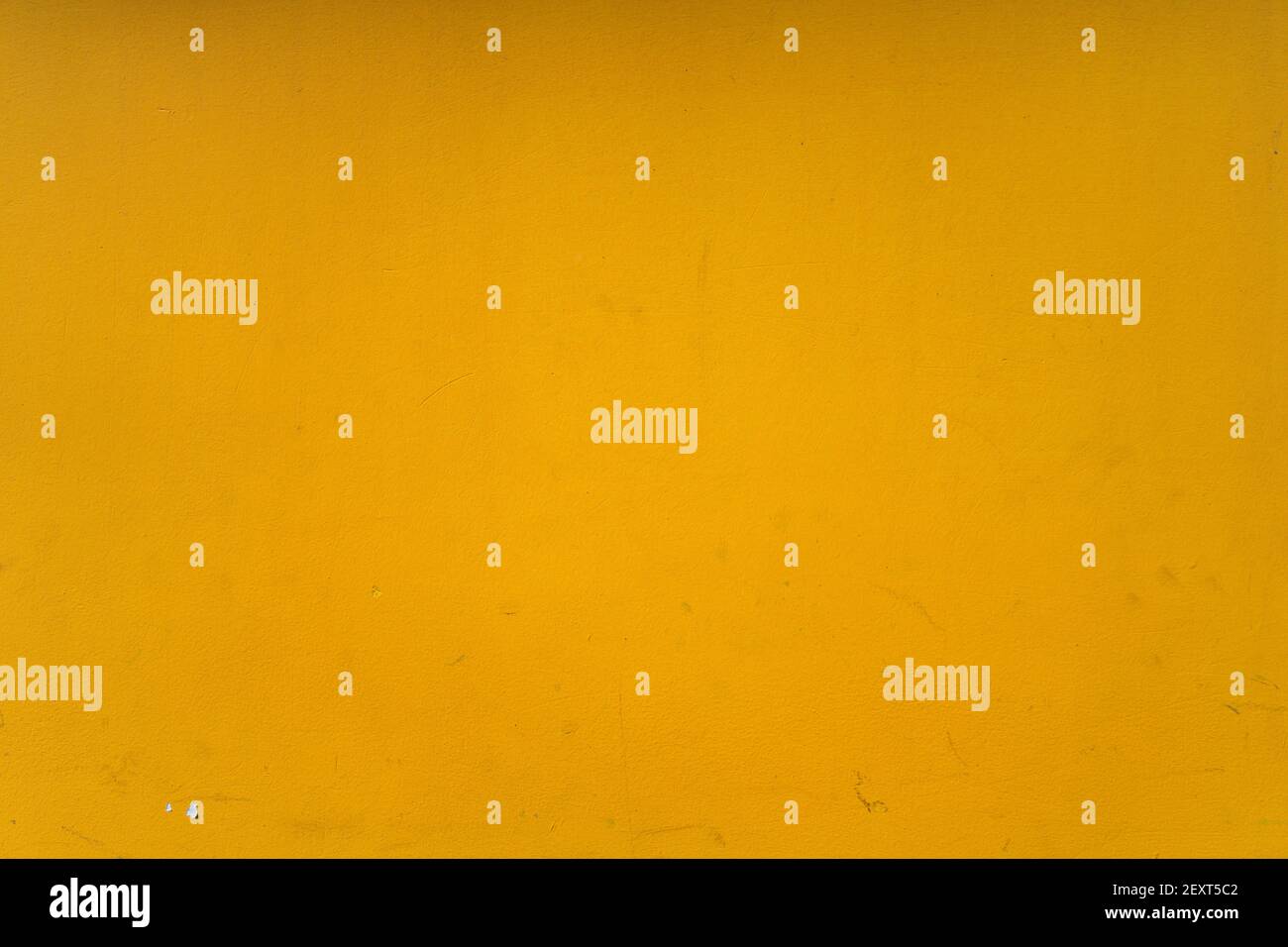 Abstract yellow cement wall texture and background. Modern grafitty ...