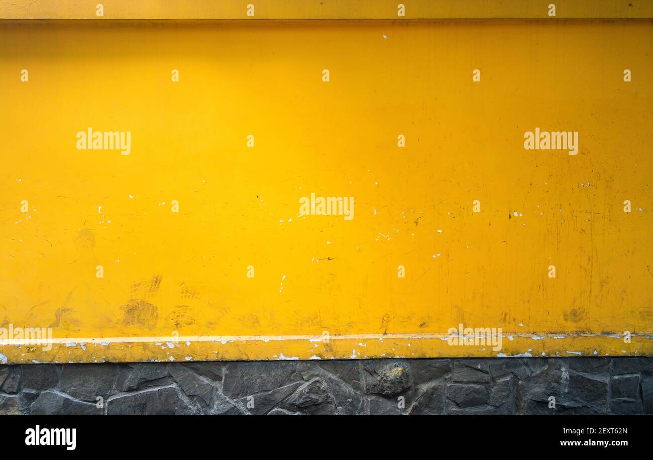 Abstract yellow cement wall texture and background. Modern grafitty ...