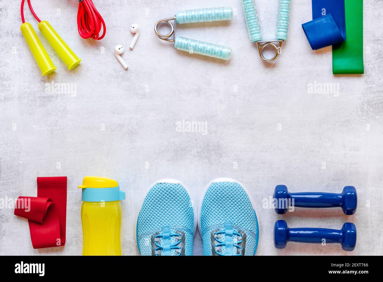 Frame of fitness gym equipment with dumbbells and sneakers Stock Photo ...