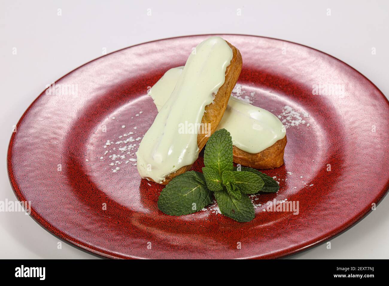 Sweet eclair dessert for gourmet served mint Stock Photo - Alamy