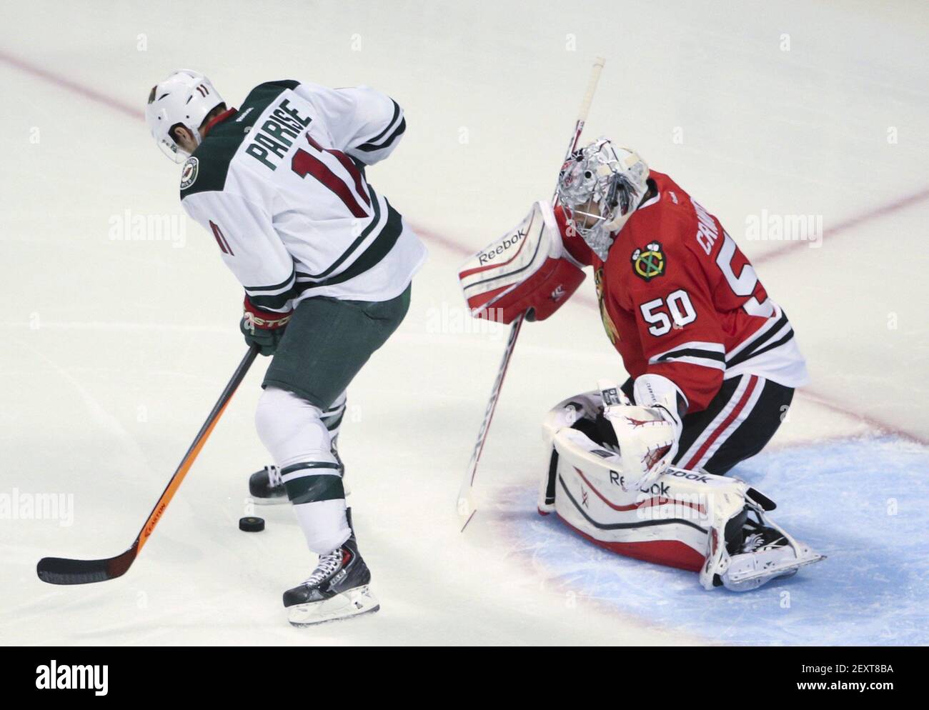 Minnesota Wild left wing Zach Parise (11) is stopped by Chicago ...