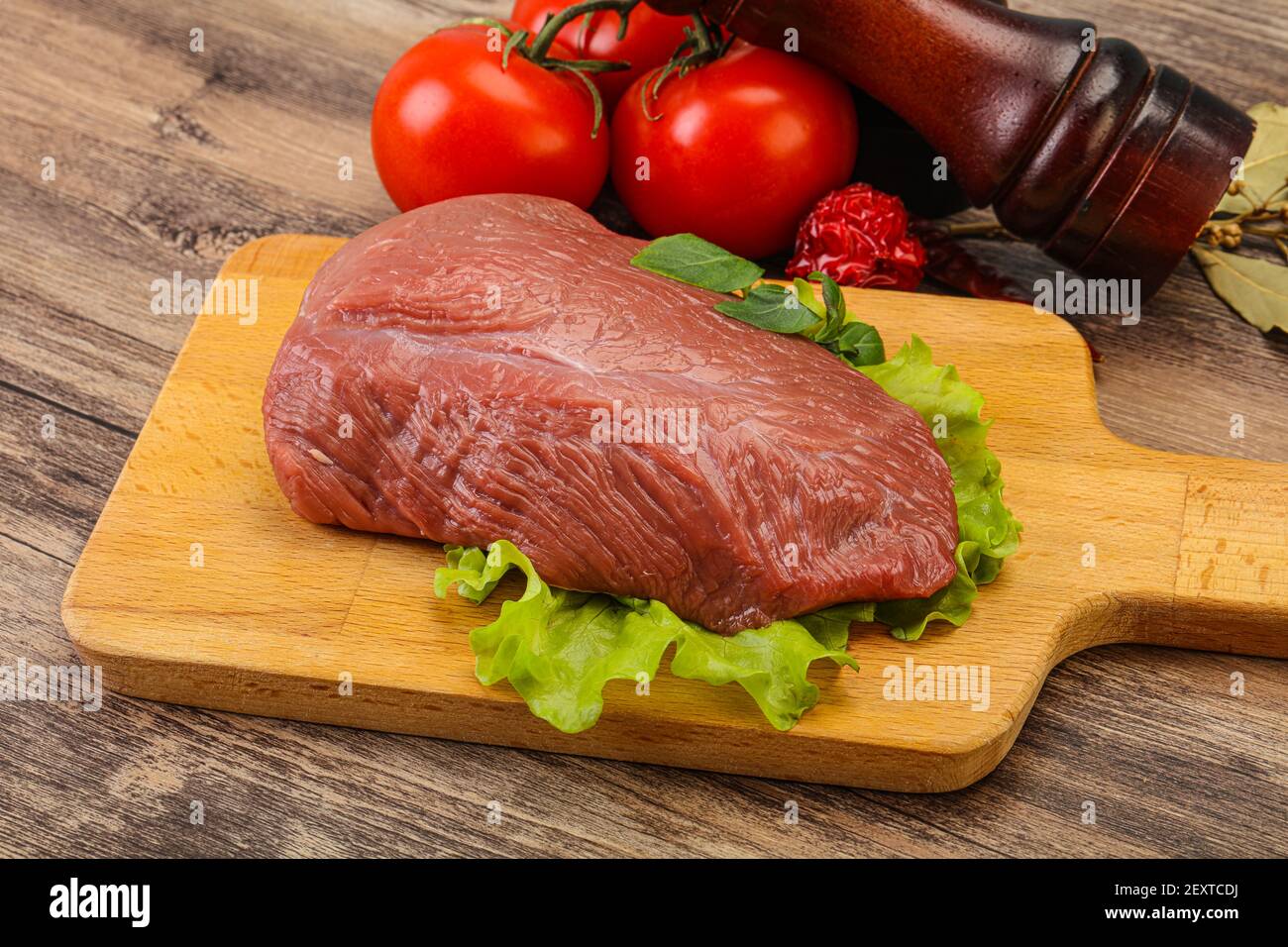 Raw beef meat piece for cooking Stock Photo - Alamy