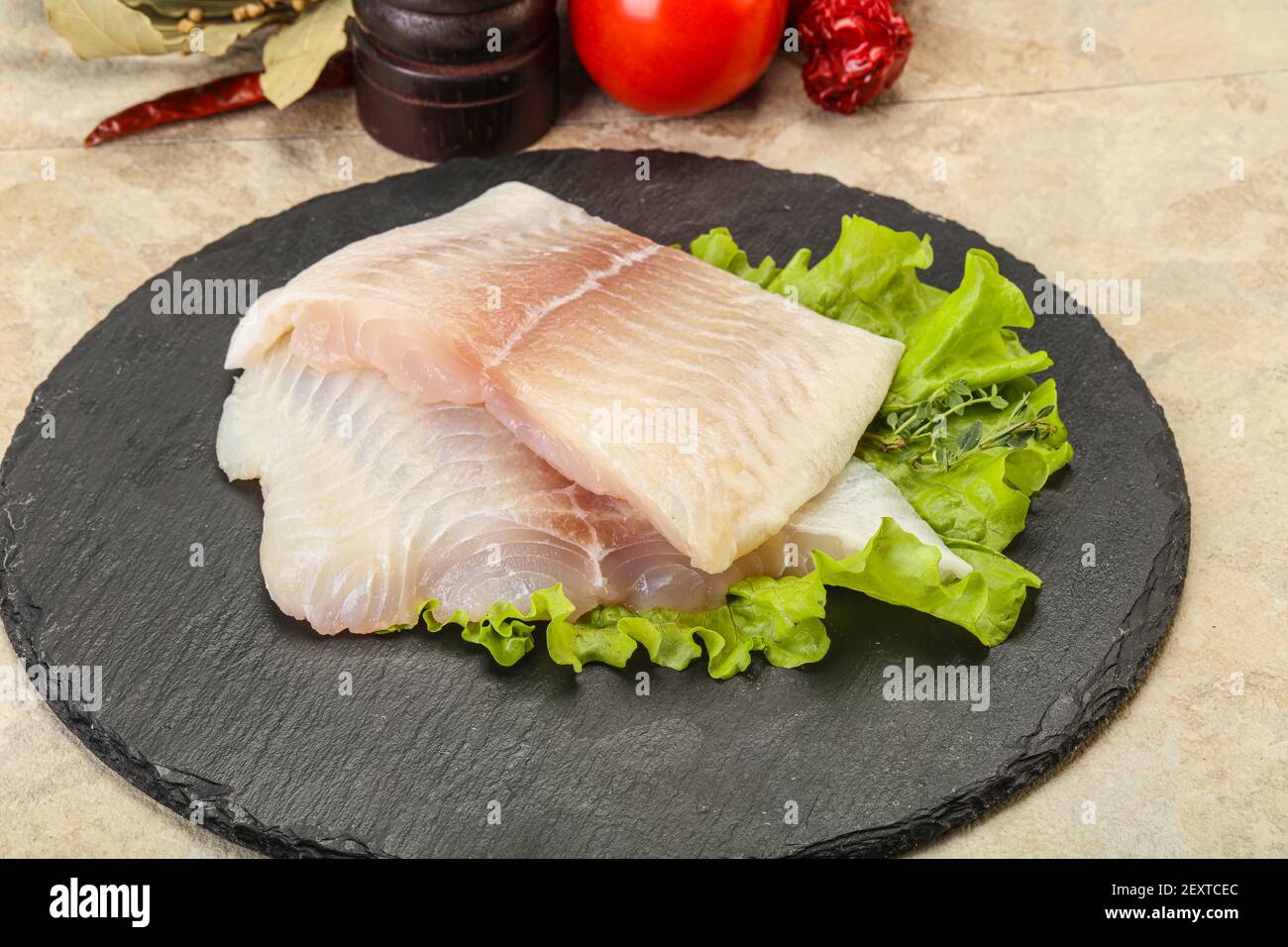 Raw pangasius fillet fish for cooking Stock Photo - Alamy