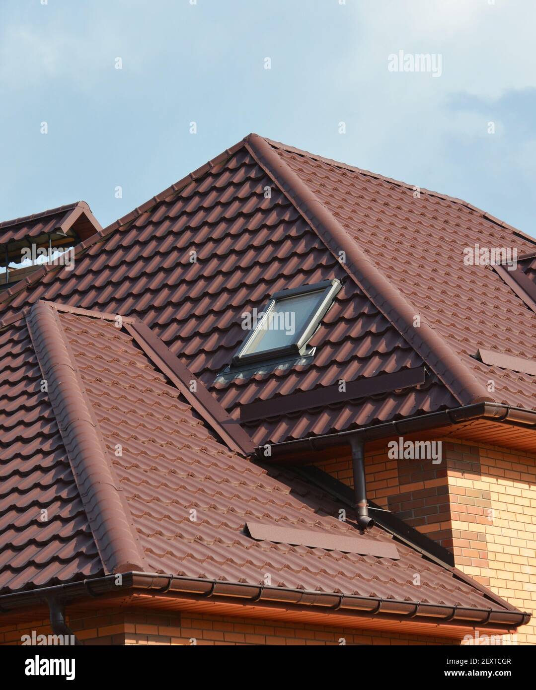 A close-up of a metal roofing waterproofing problem area with roof ...