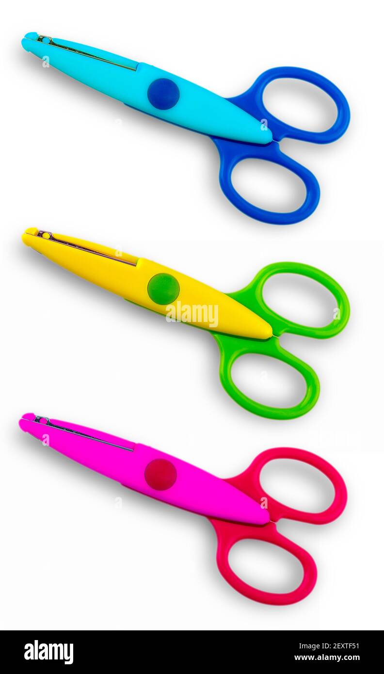 The Colore baby scissors cut out on a white background. View from above ...