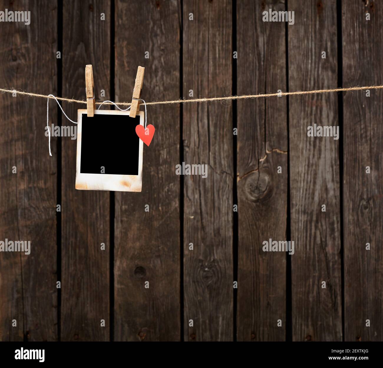 Photo Frame with Paper Heart Hang on Rope Stock Photo - Alamy