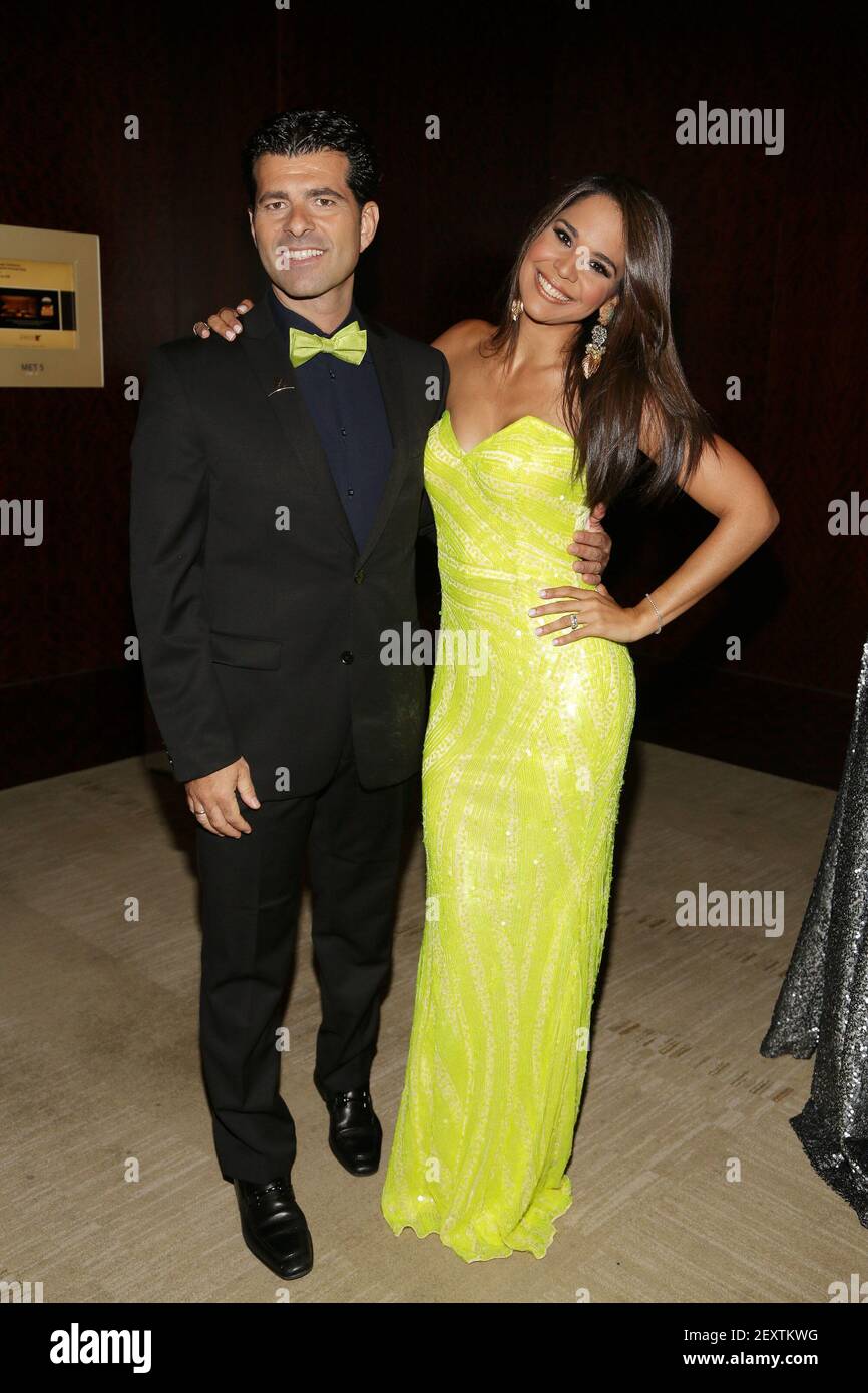 Giusseppe Russo and Mariela Encarnacion attend the 12th Annual FedEx/St ...