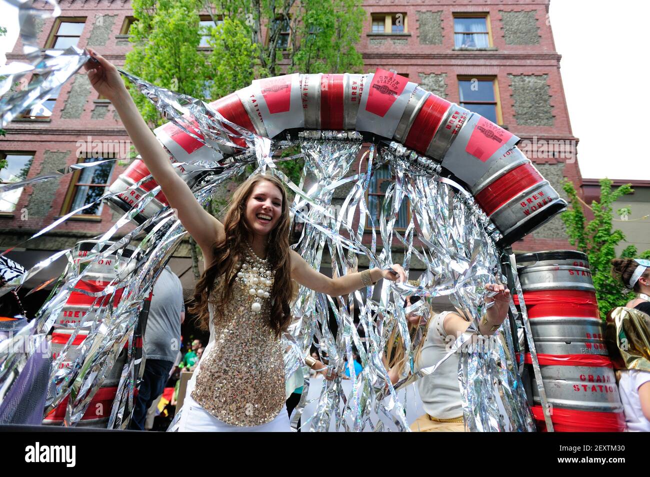 A Grain Station beer keg float parades through town during the 15th ...
