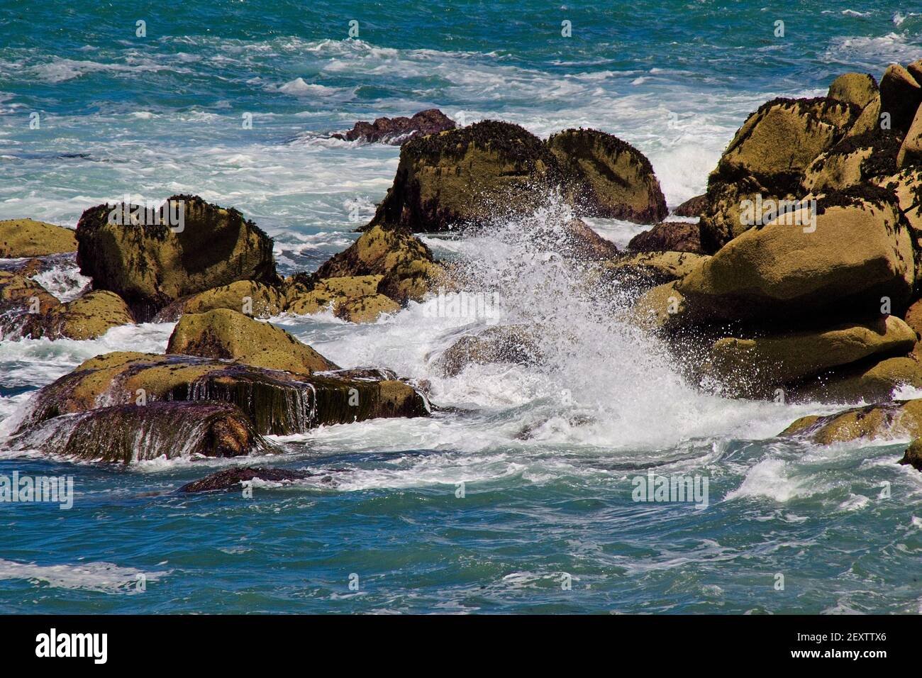 waves breaking on rocks Stock Photo - Alamy