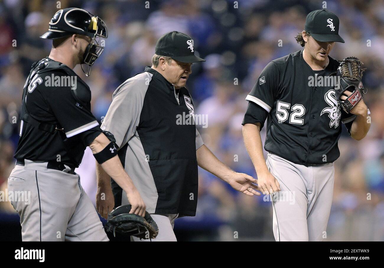 Chicago White Sox relief pitcher Jake Petricka (52) gets a visit from ...