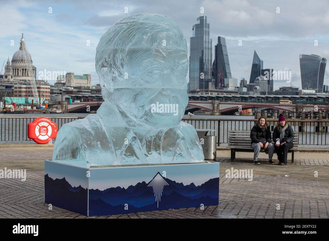 A giant ice sculpture of Sir David Attenborough stands along the ...