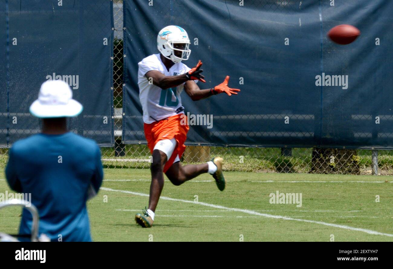 Miami Dolphins rookie wide receiver Jonathan Aiken gets ready to catch ...