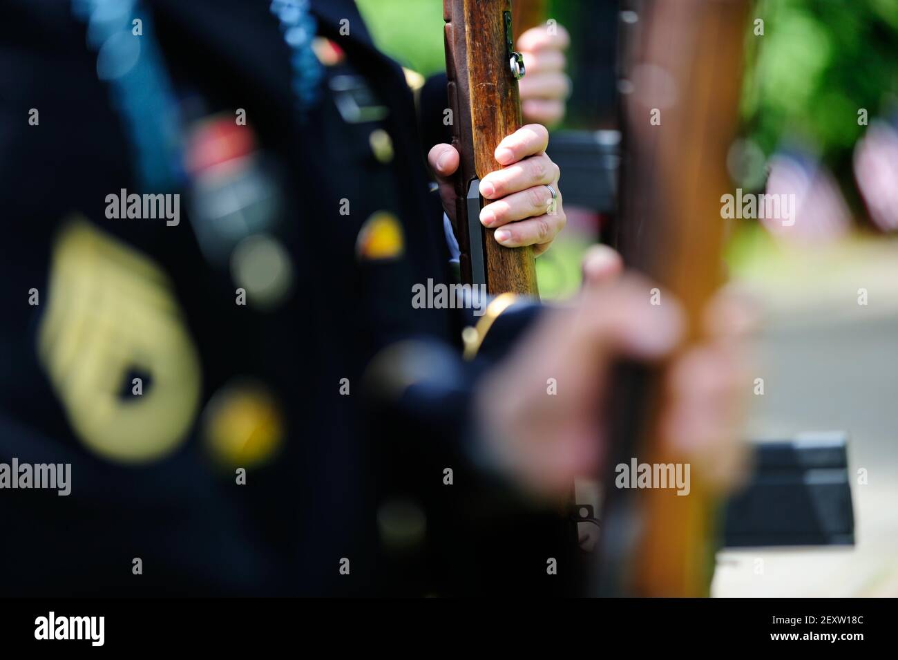 An Honor Guard unit hold their rifles on Memorial Day during a service ...