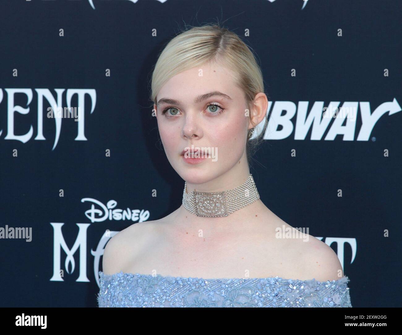 Elle Fanning attends The World Premiere of "Maleficent" held at the El ...