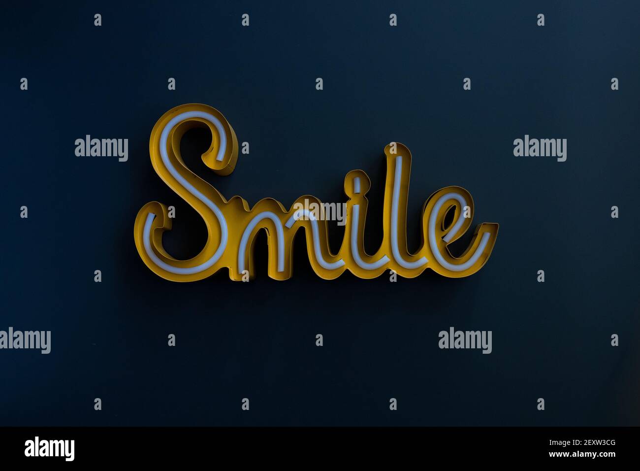 Horizontal yellow Smile sign Stock Photo - Alamy