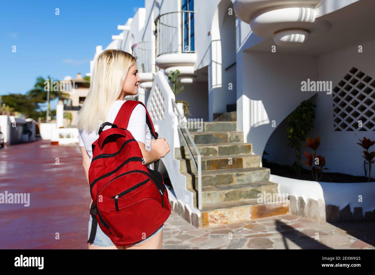 girl with a backpack travel east Stock Photo - Alamy