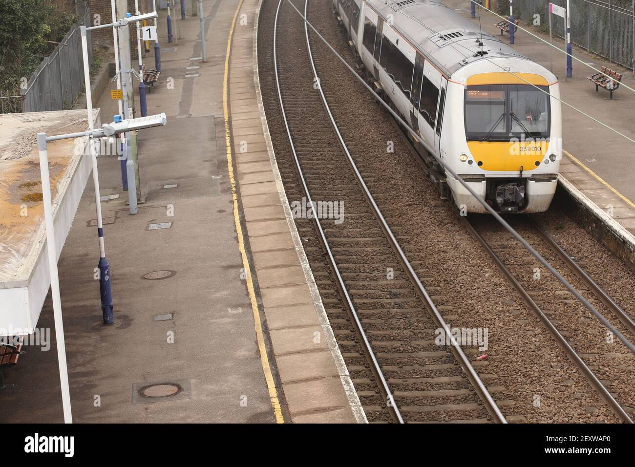A train entering the station at the c2c railway station at Purfleet-on ...
