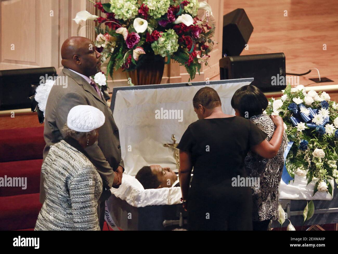 Family and friends attend the funeral of 17-year-old Dwayne Matthew ...